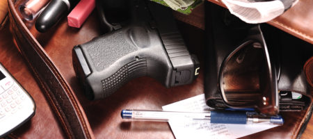 You tell us: Does carrying a gun make your job safer? - Inman